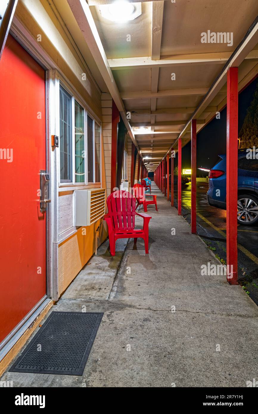 The covered patio over the doors to the rooms of the Ranch Motel in ...