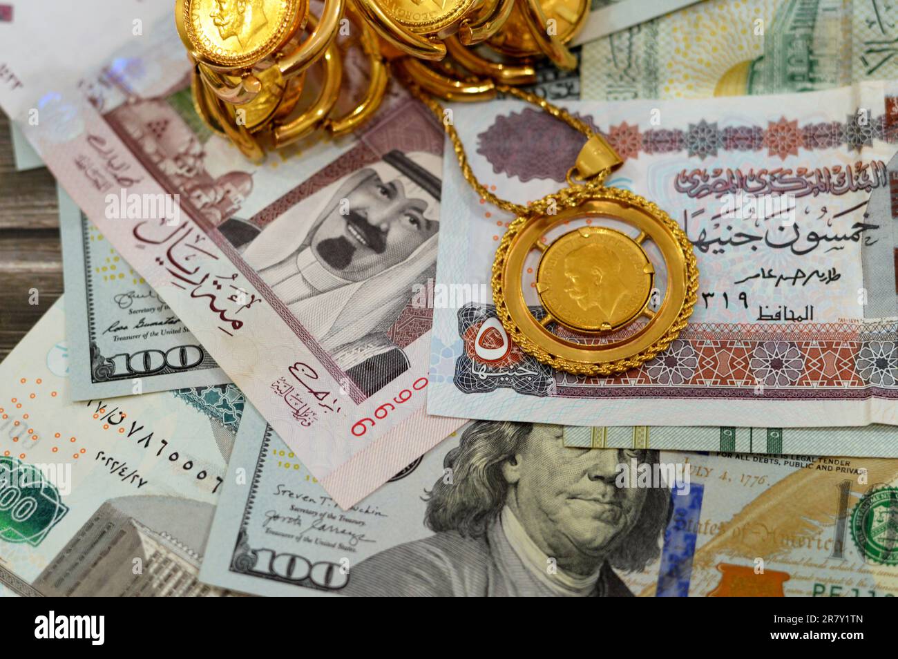 American dollars, Egyptian pounds and Saudi Arabia Riyals banknotes ...