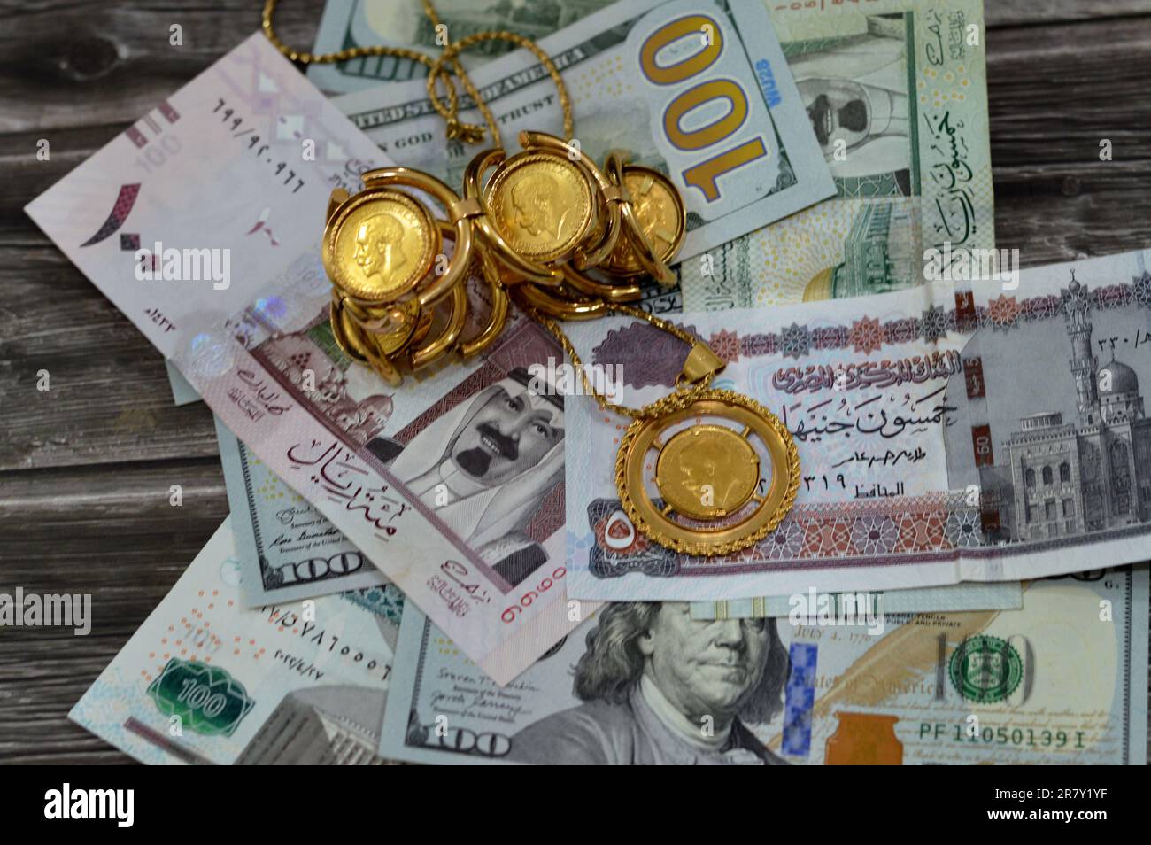 American dollars, Egyptian pounds and Saudi Arabia Riyals banknotes ...