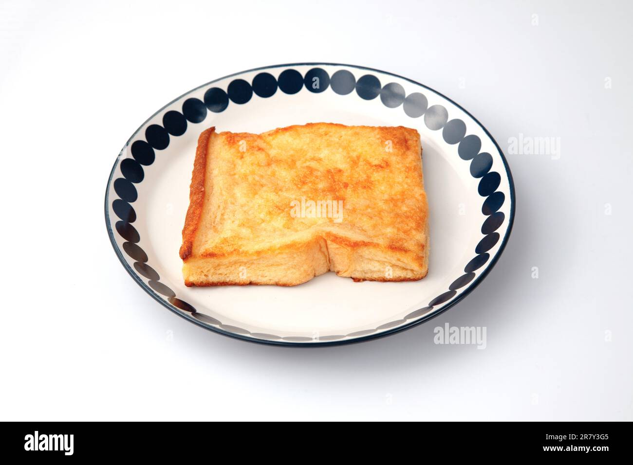 french toast on plate isolated on white background Stock Photo - Alamy