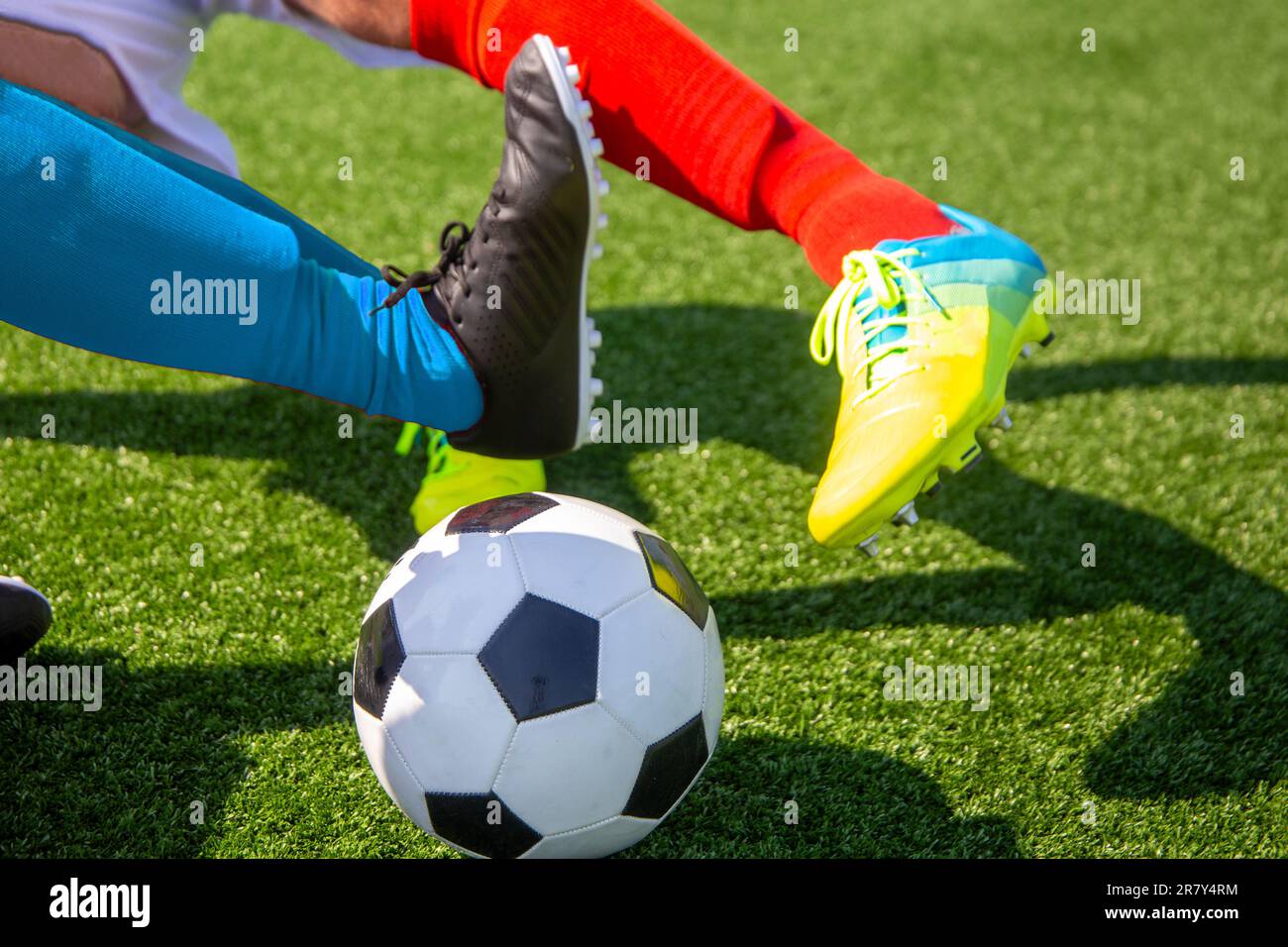 Symbol image of football: Player fouls his opponent after a rough ...