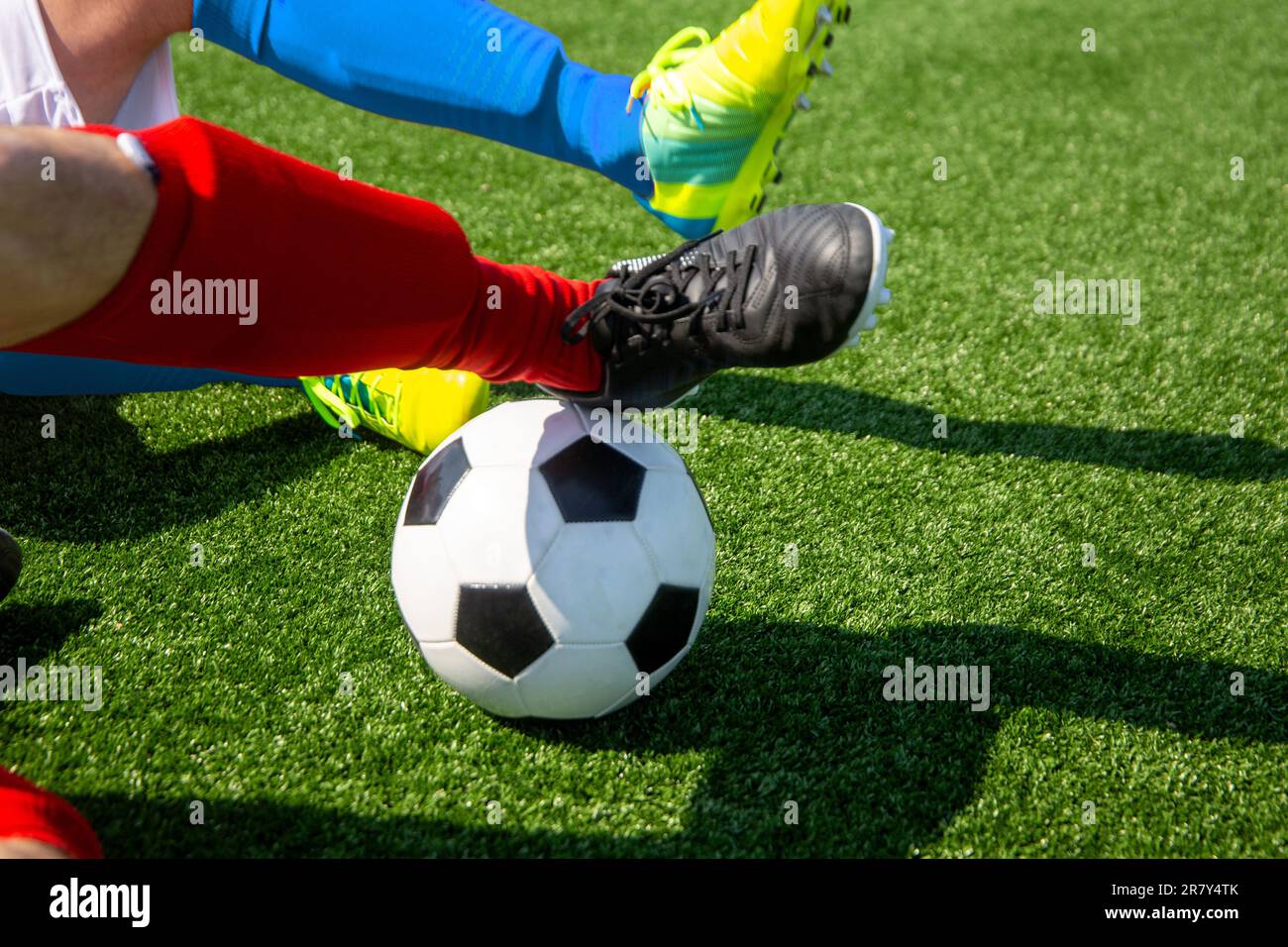 Symbol image of football: Doggedly fighting for the ball Stock Photo ...
