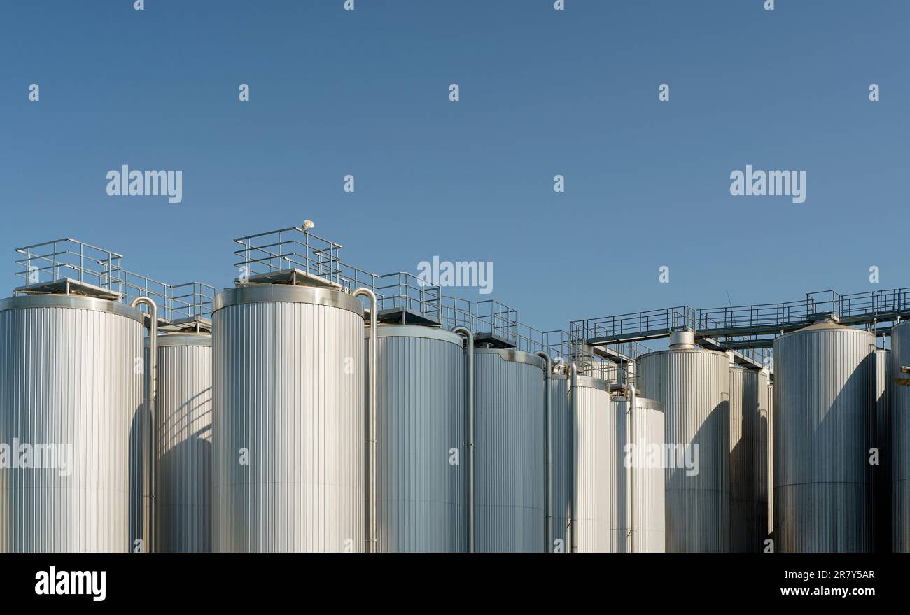 Agricultural silos for storage of grain harvest at an agricultural ...