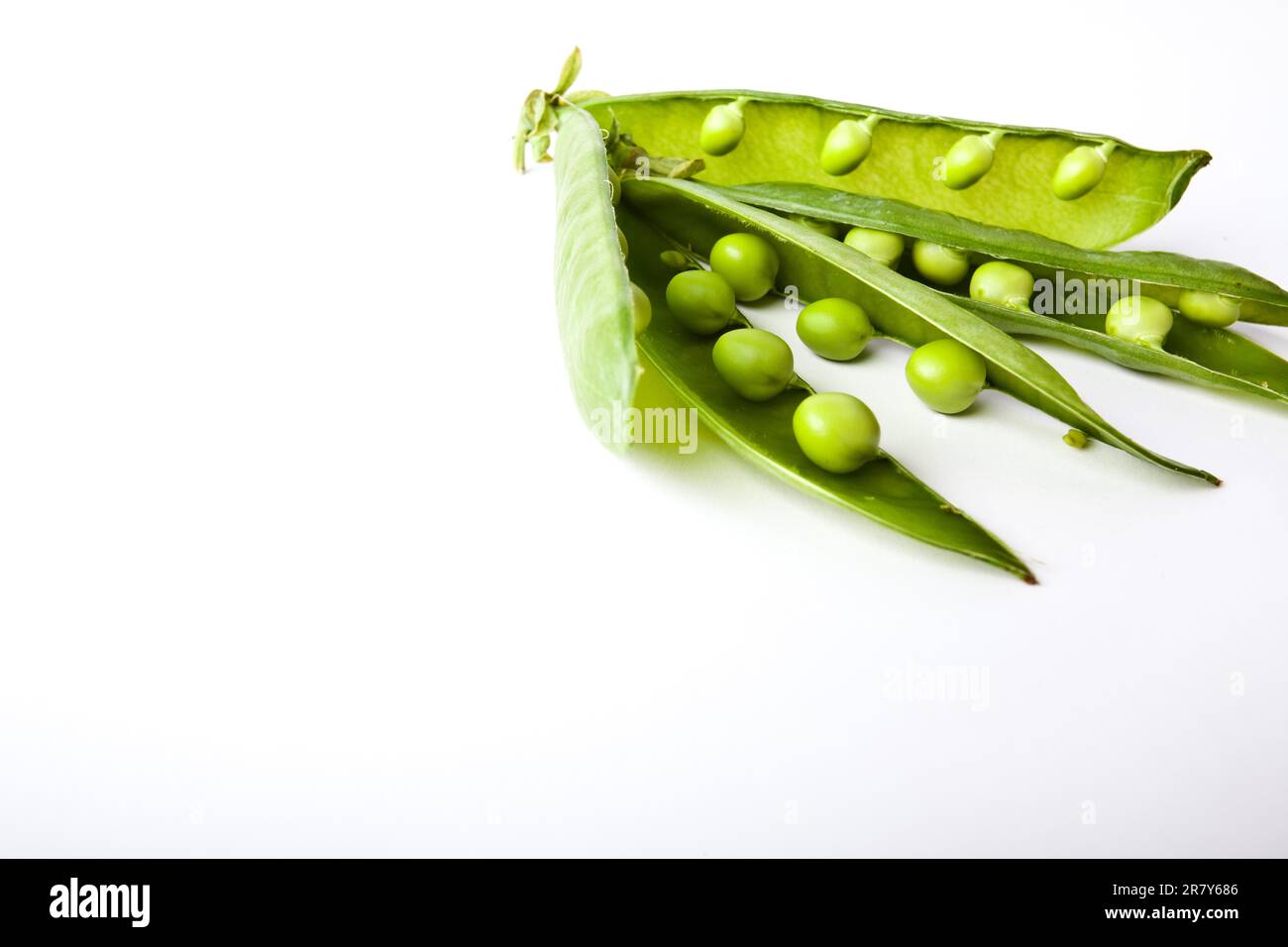Fresh pea pods with a white background Stock Photo - Alamy