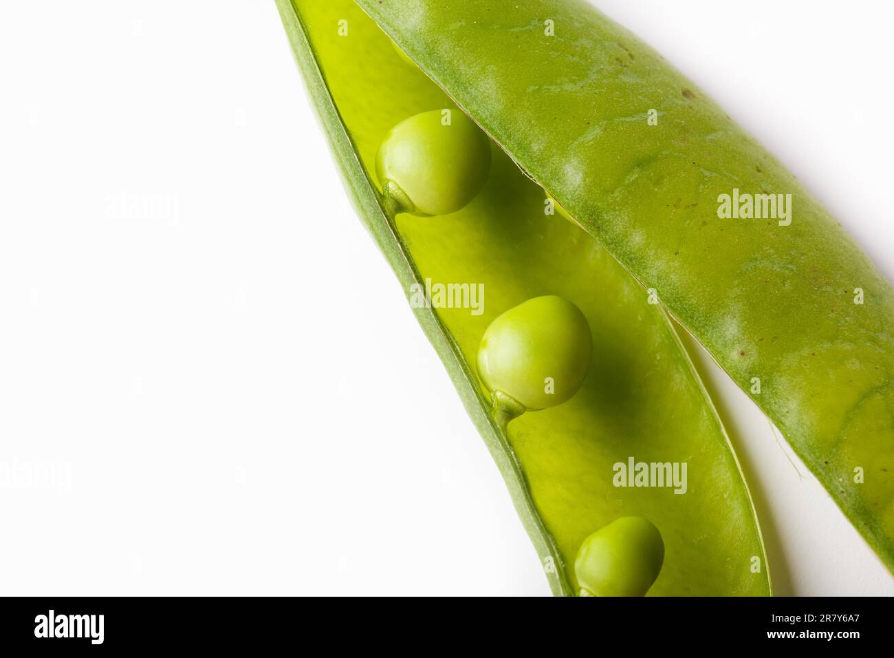 Fresh pea pods with a white background Stock Photo - Alamy