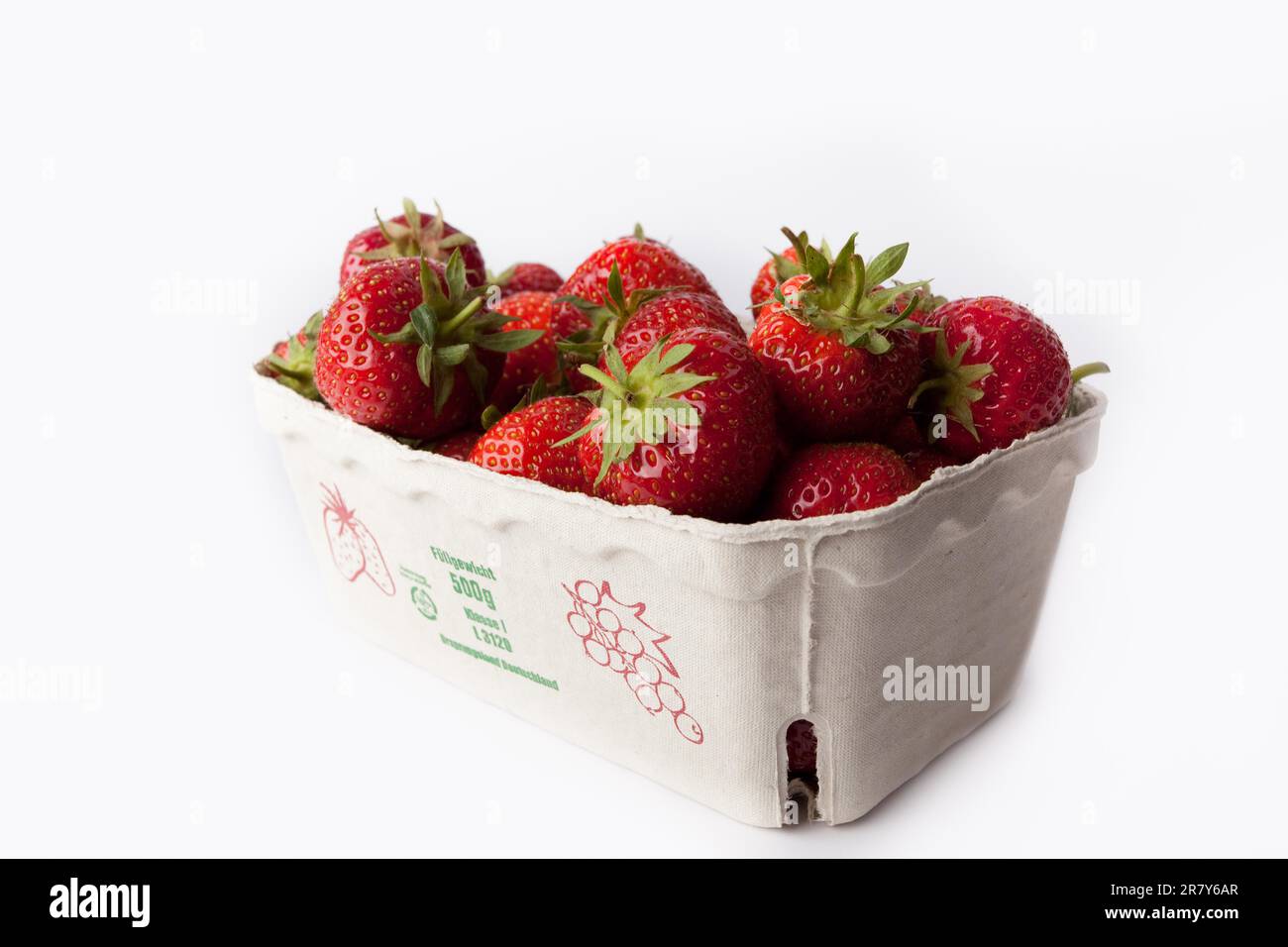 Fresh strawberries in cardboard bowl on white background Stock Photo ...