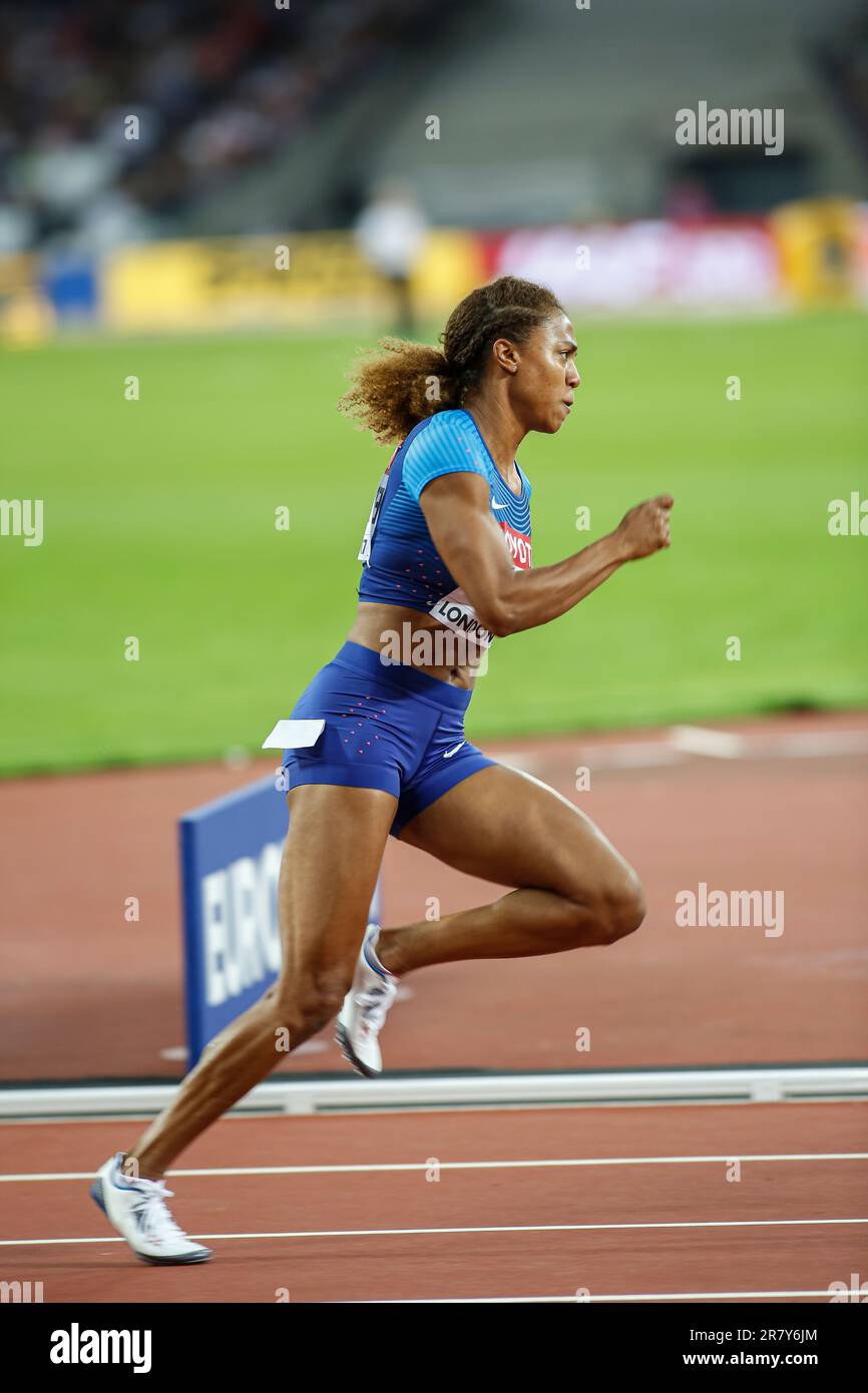 Kori Carter participating in the 400 meters hurdles at the World ...