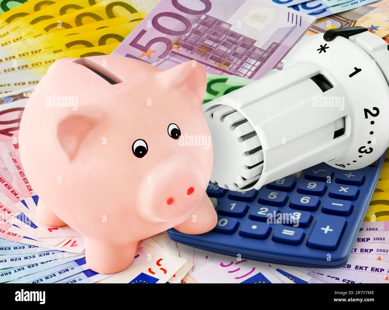 Energy costs and heating thermostat, Euro, calculator and Piggy Bank ...