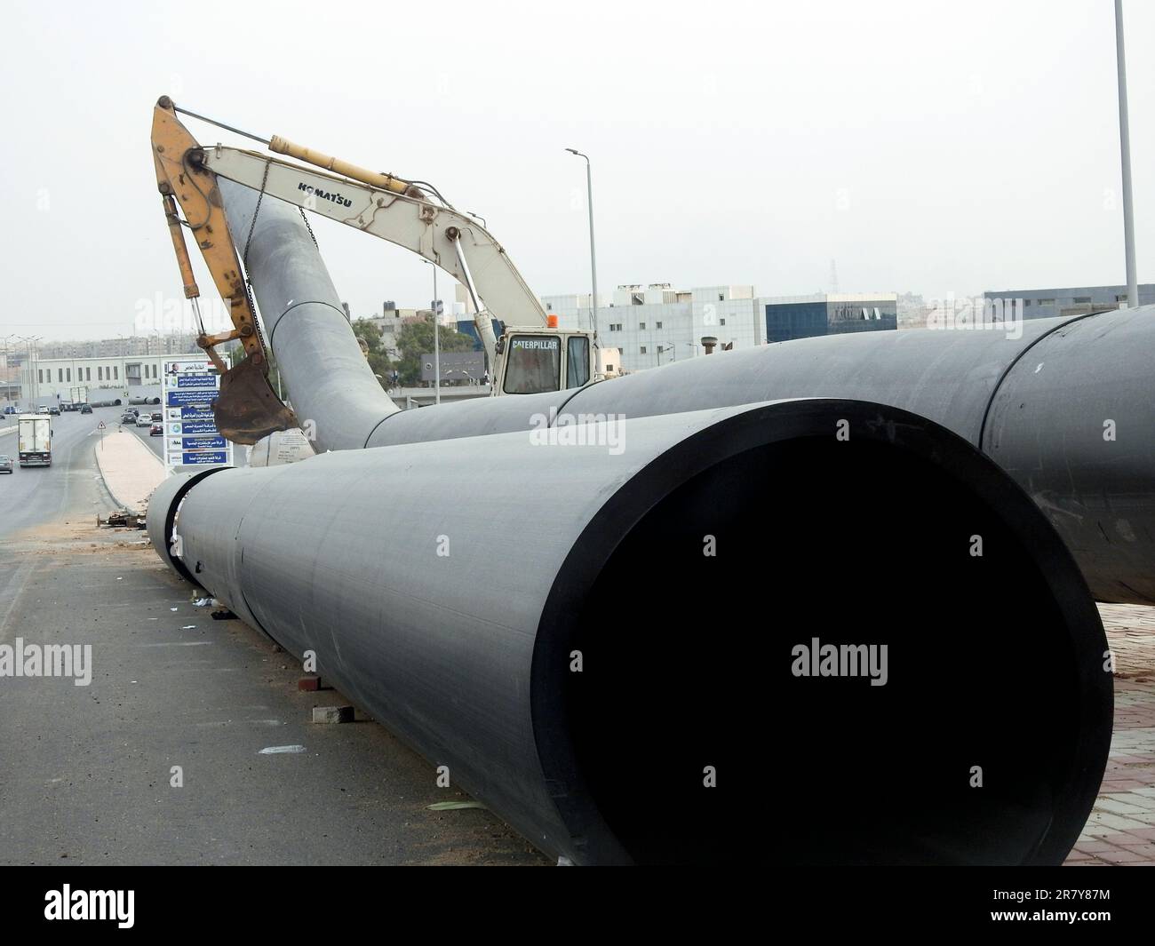 Cairo, Egypt, May 30 2023: preparations to place large water pipe parts ...