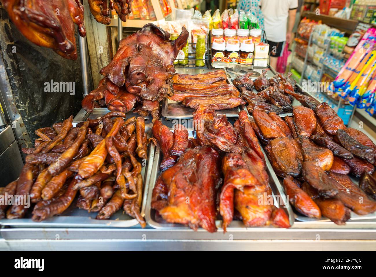 Roasted pig offering in the streets of Chinatown in the Bangkok ...