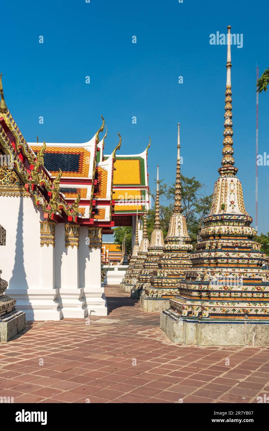 The temple complex Wat Pho includes seventy-one small Chedis called ...