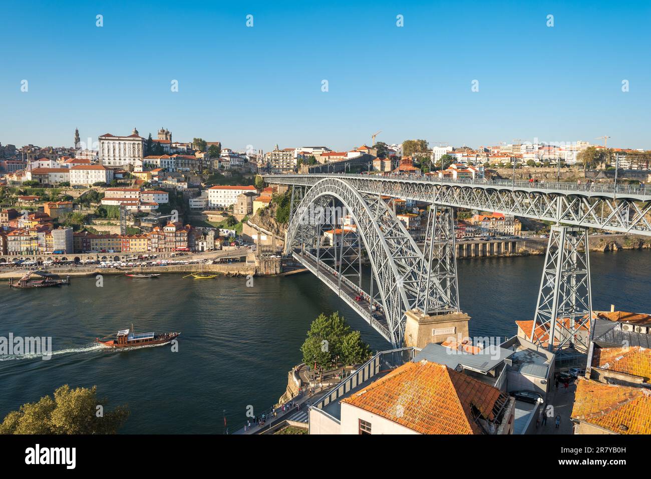 The Dom Luis I Bridge, is a double-deck metal arch bridge that spans ...