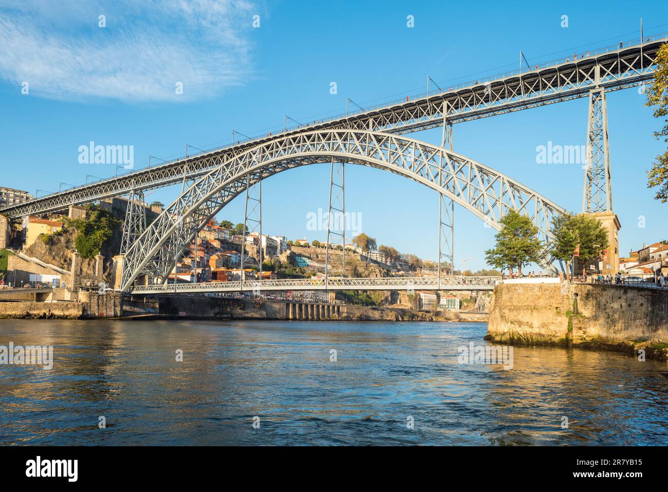 The Dom Luis I Bridge, is a double-deck metal arch bridge that spans ...