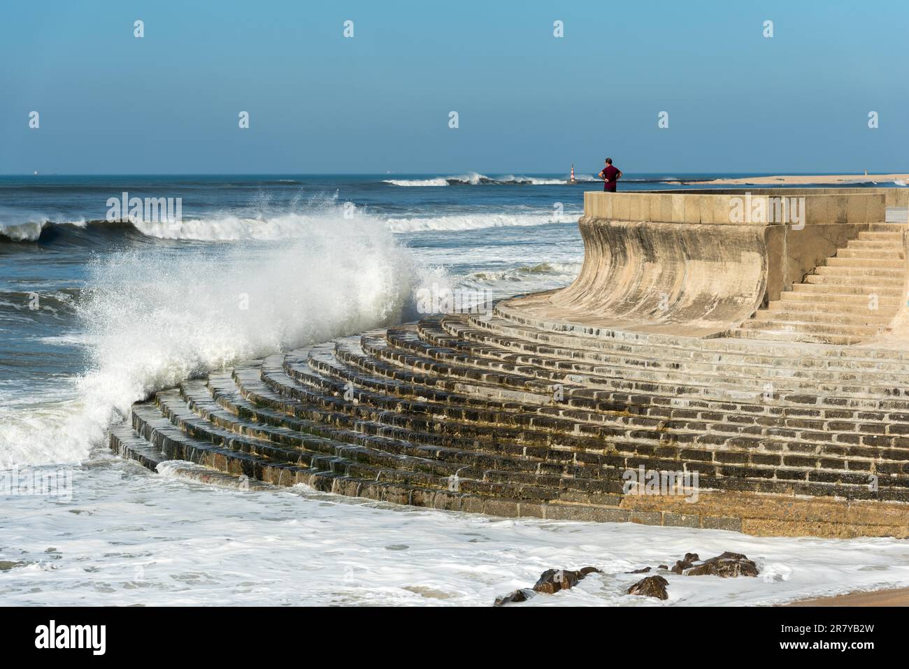 Breakwater and viewpoint in the seaside village Granja in the south of ...