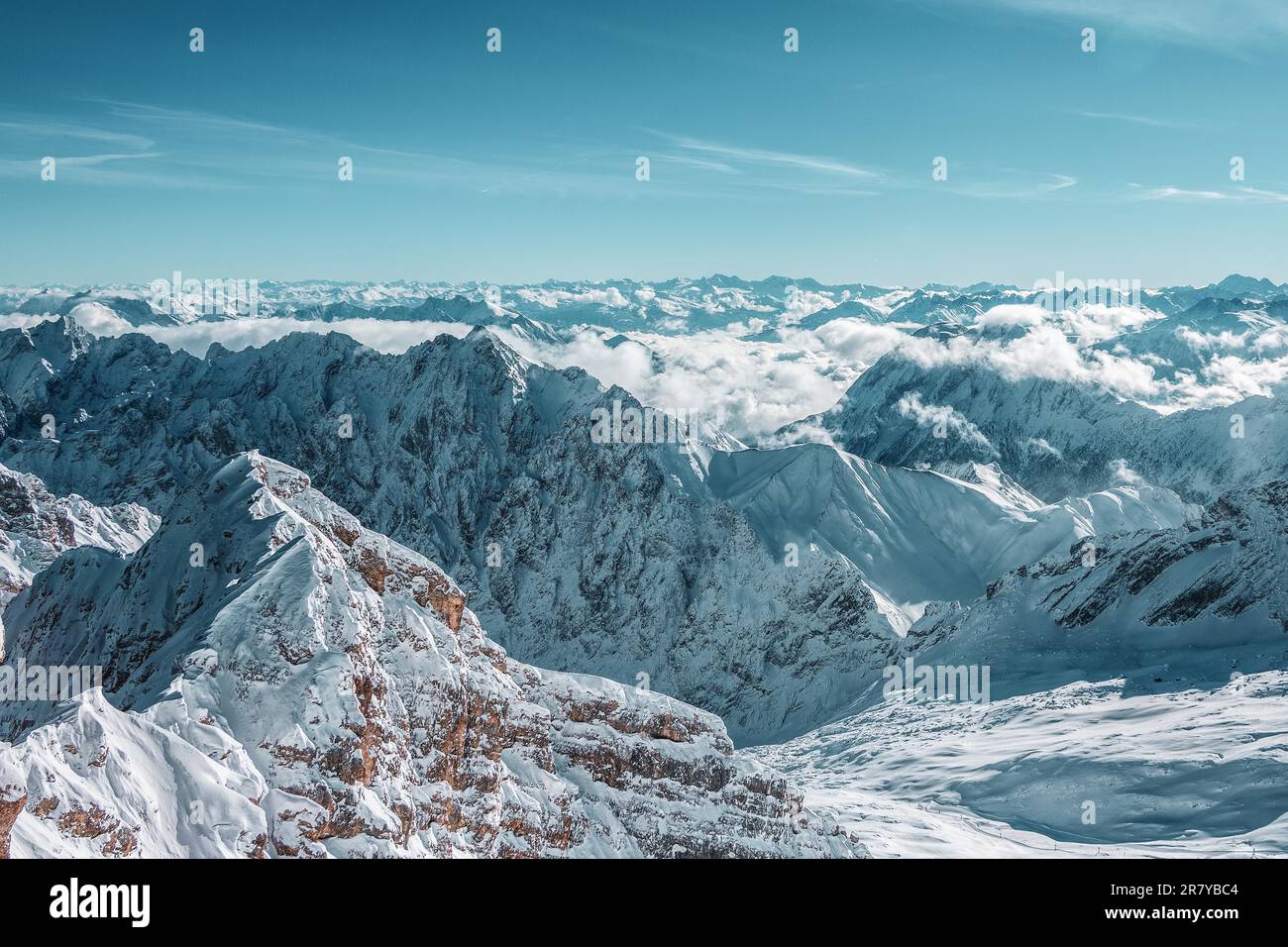 Mountain panorama from the viewing platform on the Zugspitze. German ...
