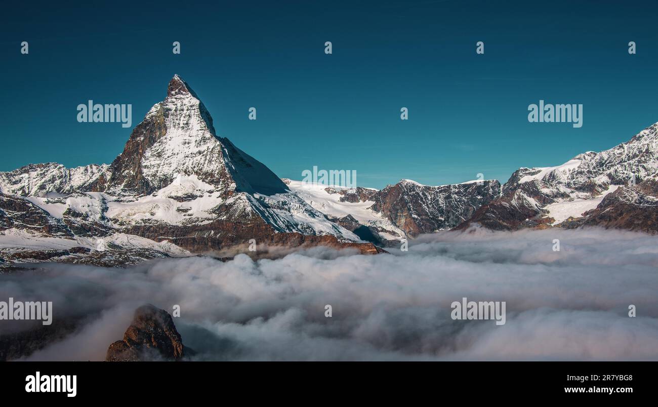 The matterhorn high above the clouds hi-res stock photography and ...