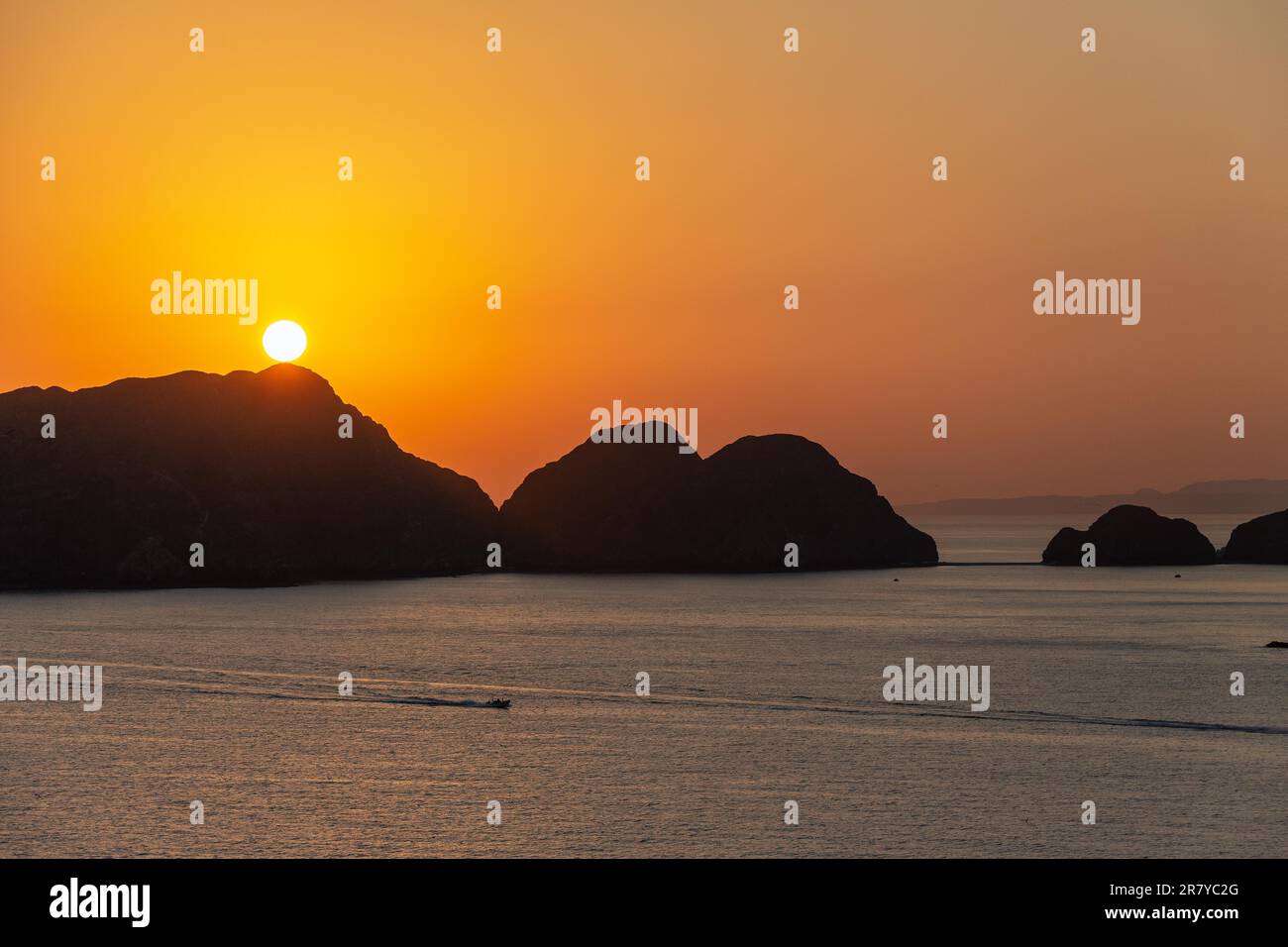 Sunrise off the coast of Oman Stock Photo - Alamy