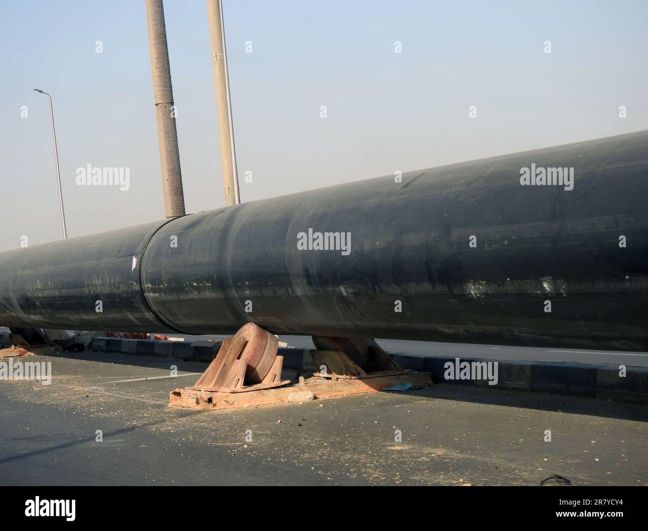 Cairo, Egypt, May 23 2023: preparations to place large water pipe parts ...