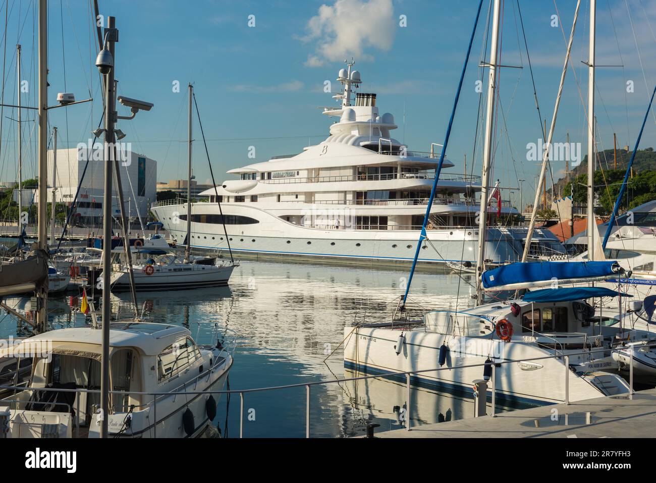 Luxury yachts moored in the marina Port Vell in Barcelona. The city is ...