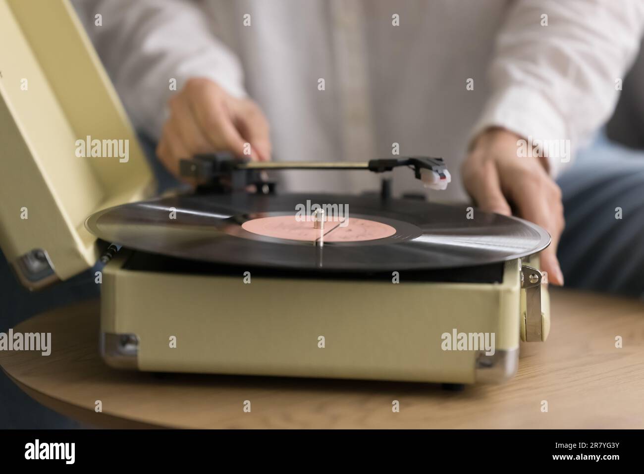 Vinyl turntable plays record hi-res stock photography and images - Alamy