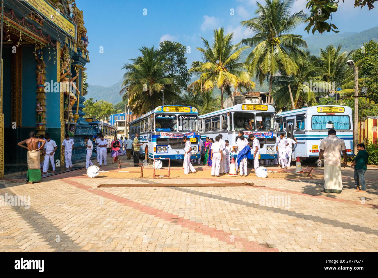 Believers and visitors at the gatehouse tower in the Hindu temple in ...