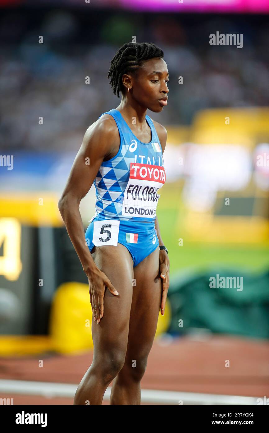 Ayomide Folorunso participating in the 400 meters hurdles at the World ...