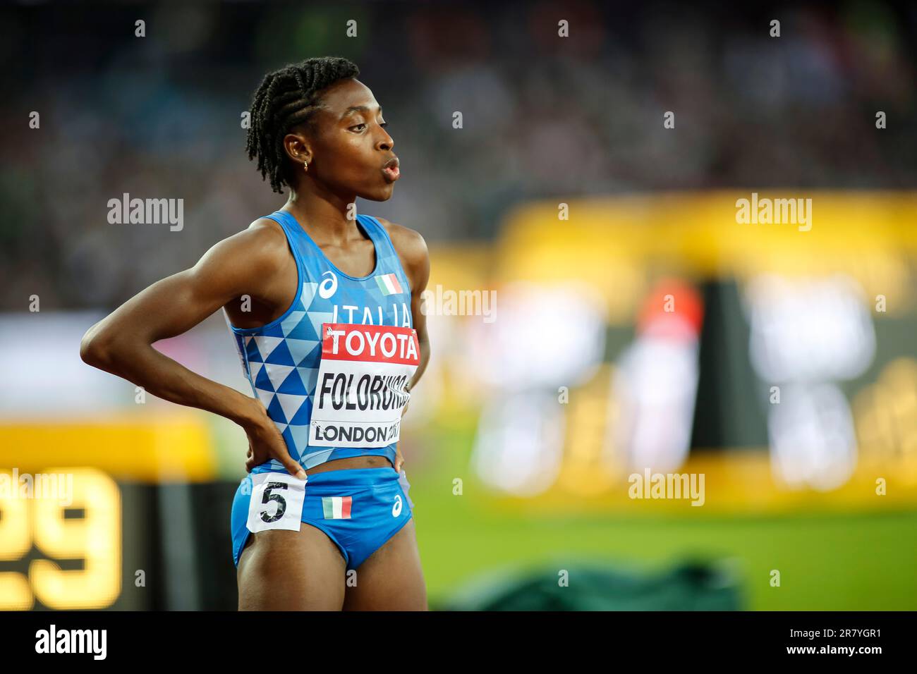 Ayomide Folorunso participating in the 400 meters hurdles at the World ...
