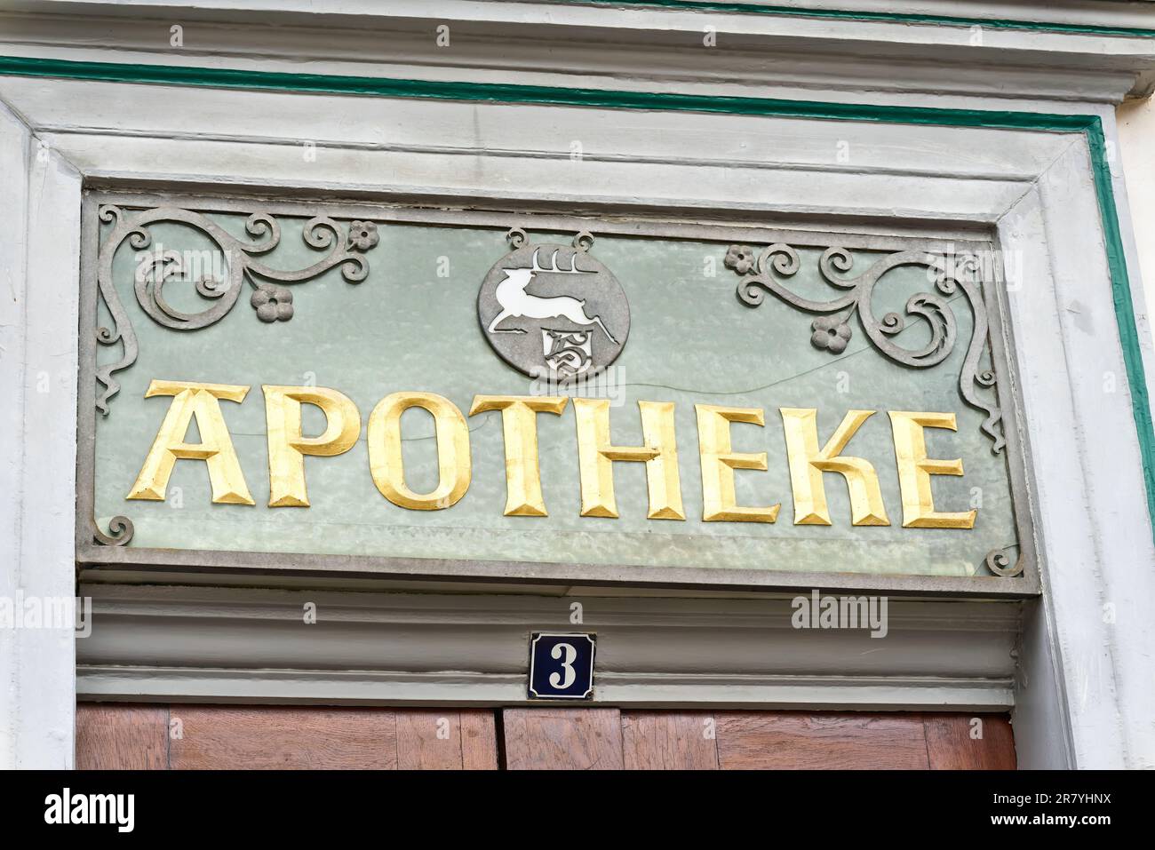 Lettering above the entrance door of a historic pharmacy in the old ...