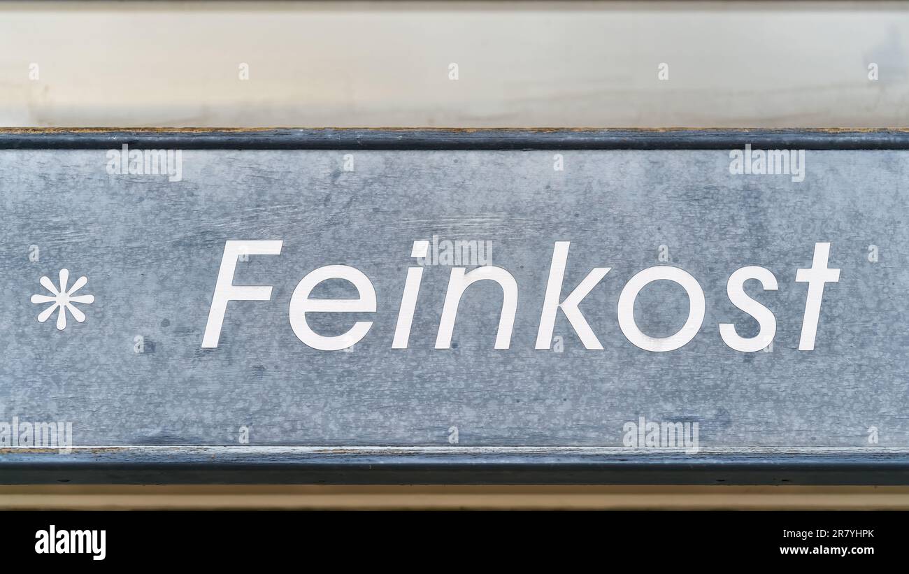 Lettering Feinkost above the entrance to a shop in the old town of ...