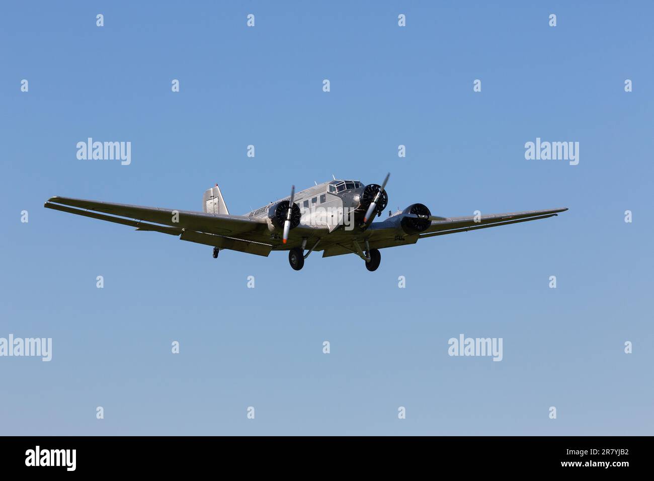 An old three-engine airliner in flight, the Ju 52 Stock Photo - Alamy