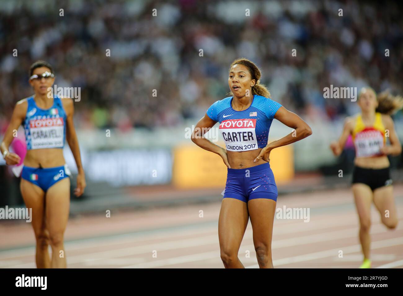 Kori Carter participating in the 400 meters hurdles at the World ...