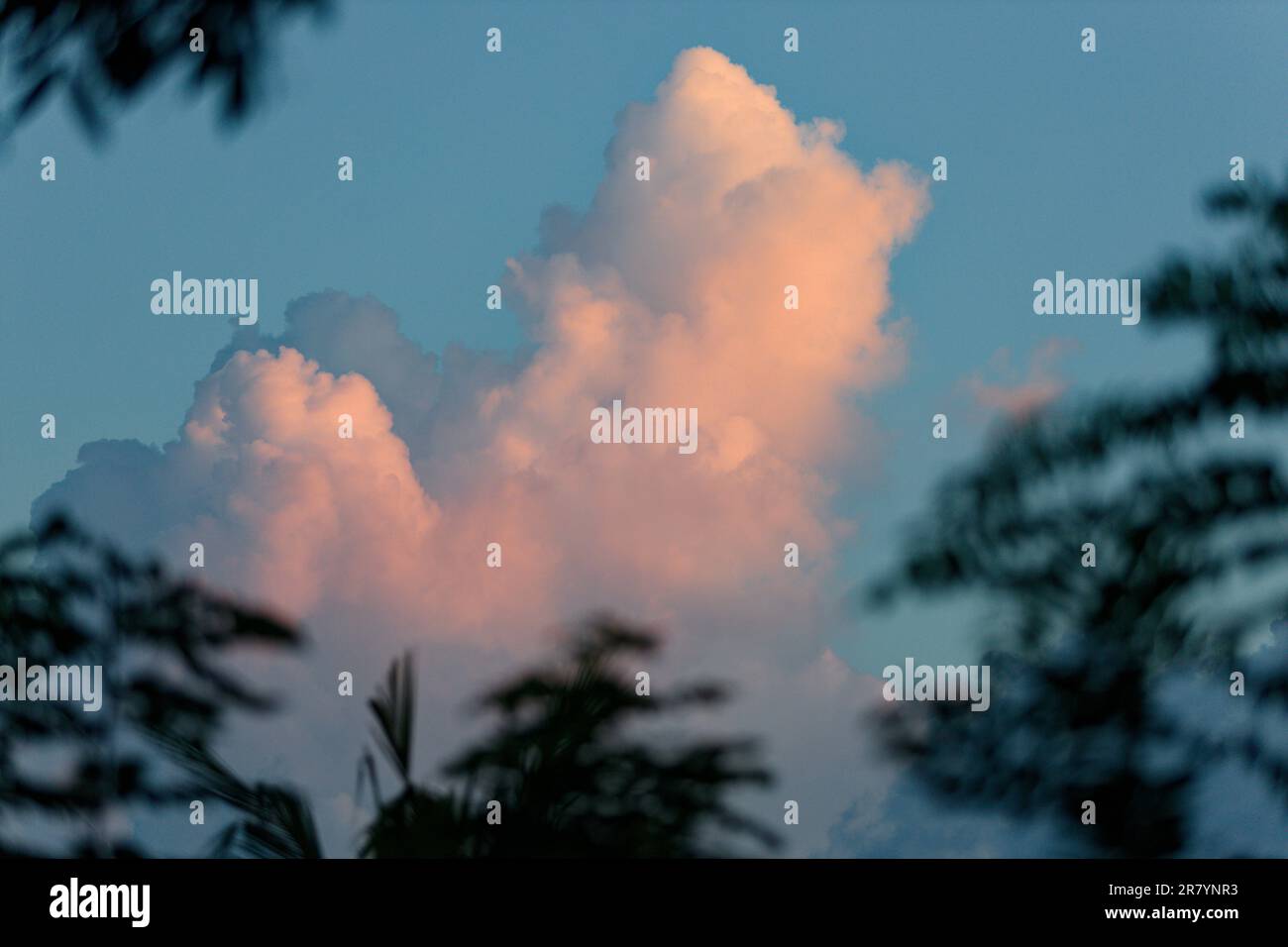 Beautiful natural cloud formation in sunset with golden orange shade in ...