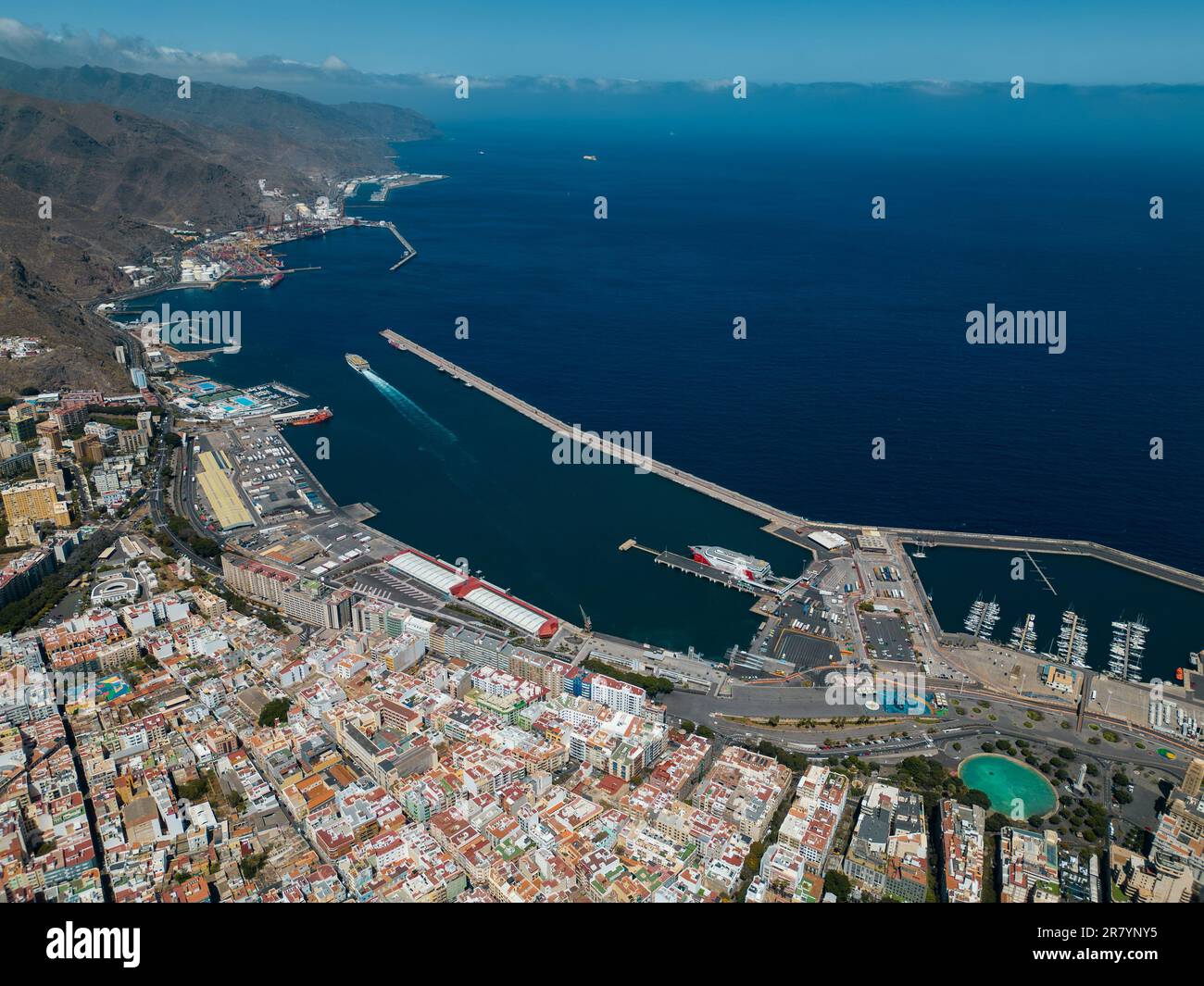 blue water of port, pier and harbor of Tenerife capital Santa Cruz ...
