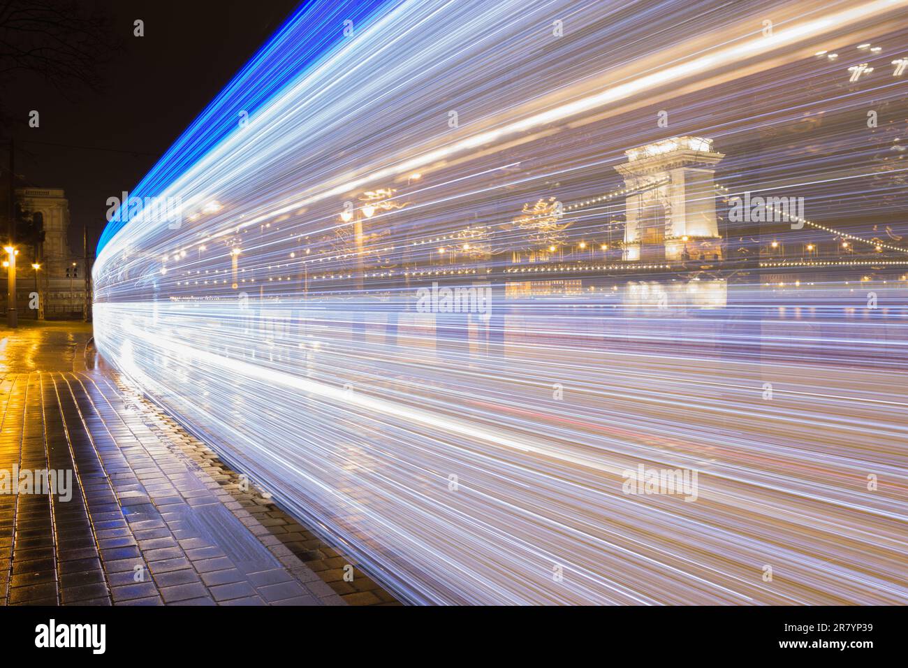 A landscape of a busy road with long exposure lights at night in ...