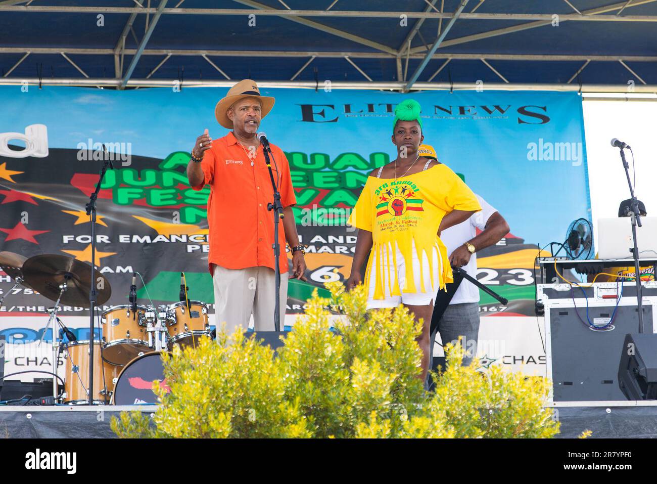 Dallas, USA. 17th June, 2023. Two organizers speak at a Juneteenth ...