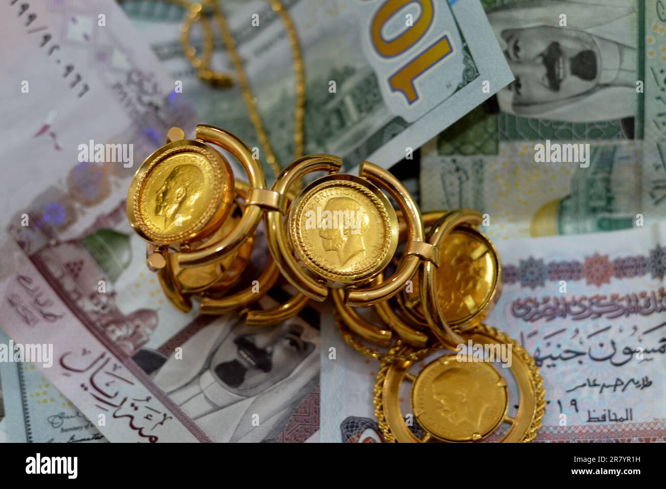 American dollars, Egyptian pounds and Saudi Arabia Riyals banknotes ...