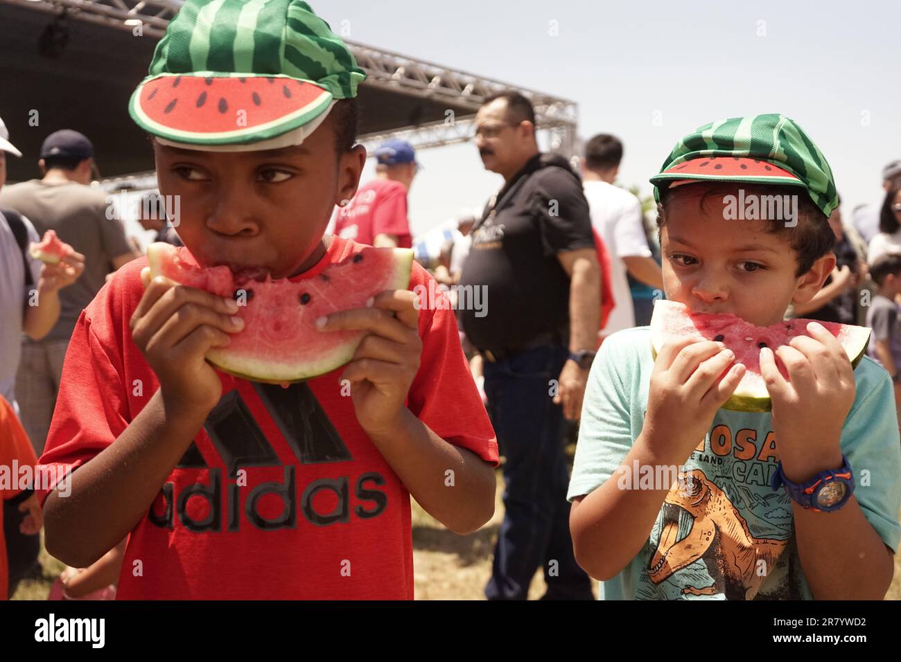 Los Angeles, USA. 17th June, 2023. Two kids taste watermelons at the ...