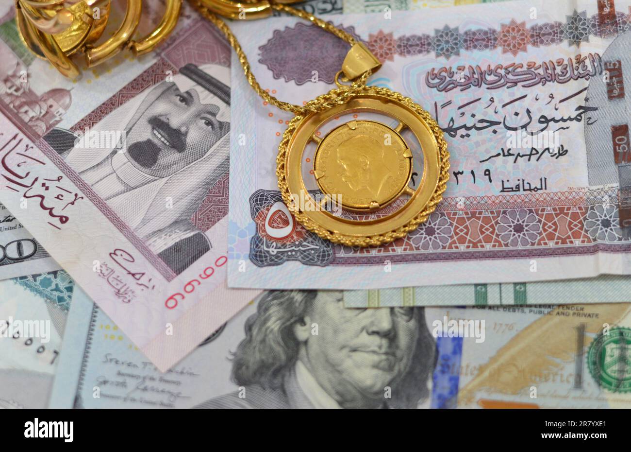 American dollars, Egyptian pounds and Saudi Arabia Riyals banknotes ...