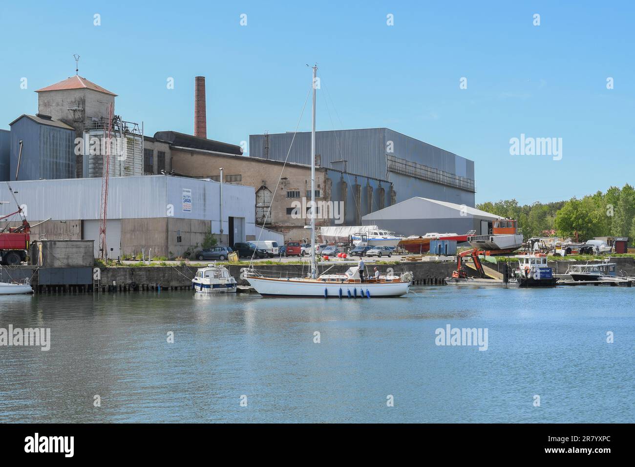 Launching of boats in the dockyard in spring Stock Photo - Alamy
