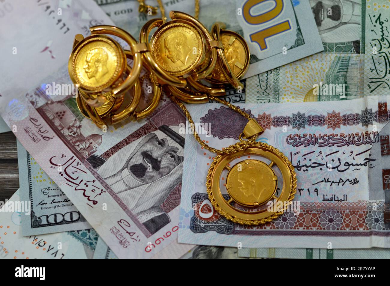 American dollars, Egyptian pounds and Saudi Arabia Riyals banknotes ...