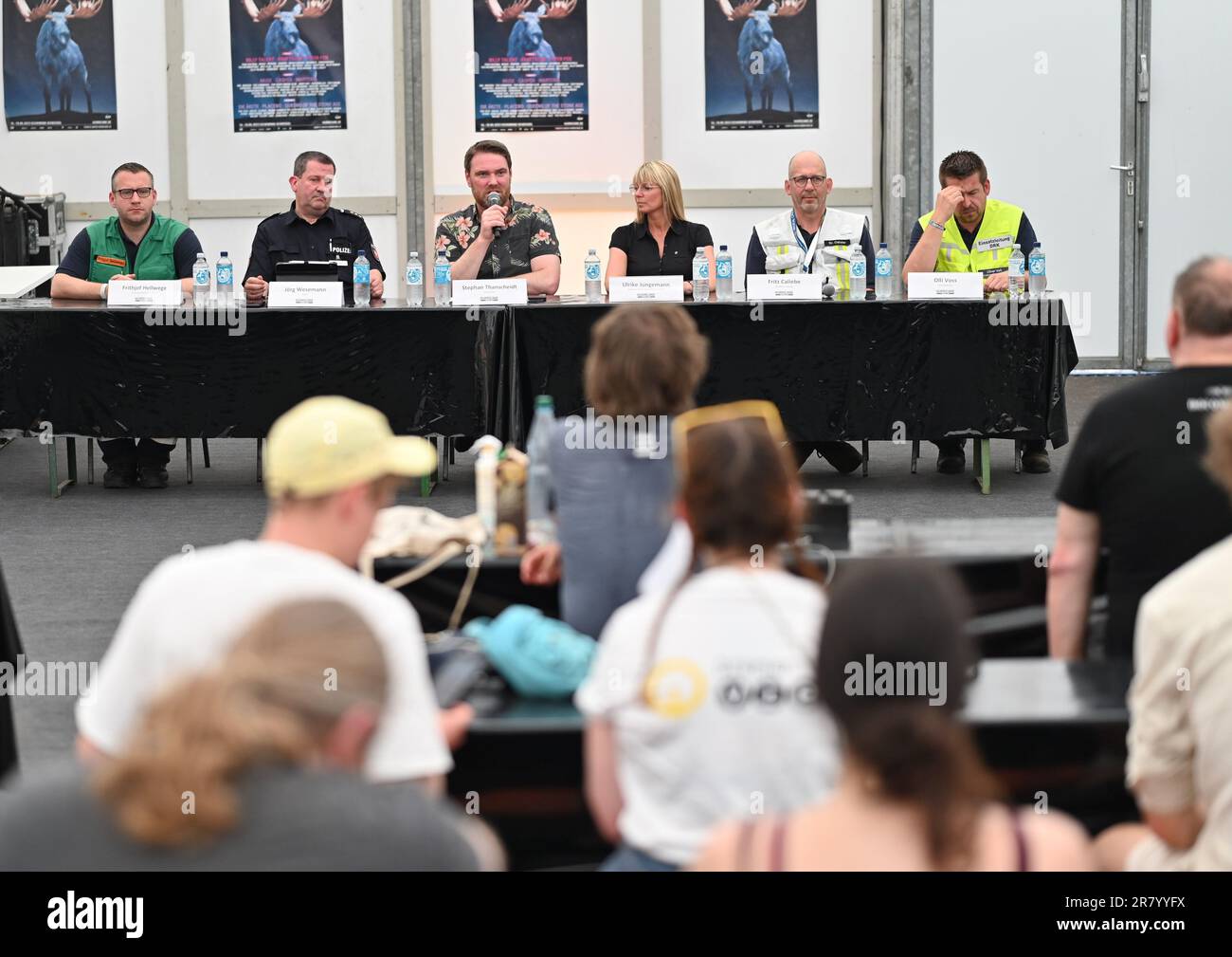 18 June 2023, Lower Saxony, Scheeßel: Organizers and security ...