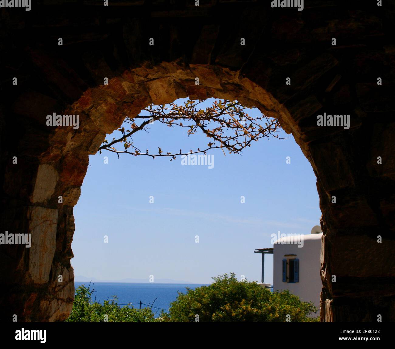 View through a stone arch Stock Photo - Alamy