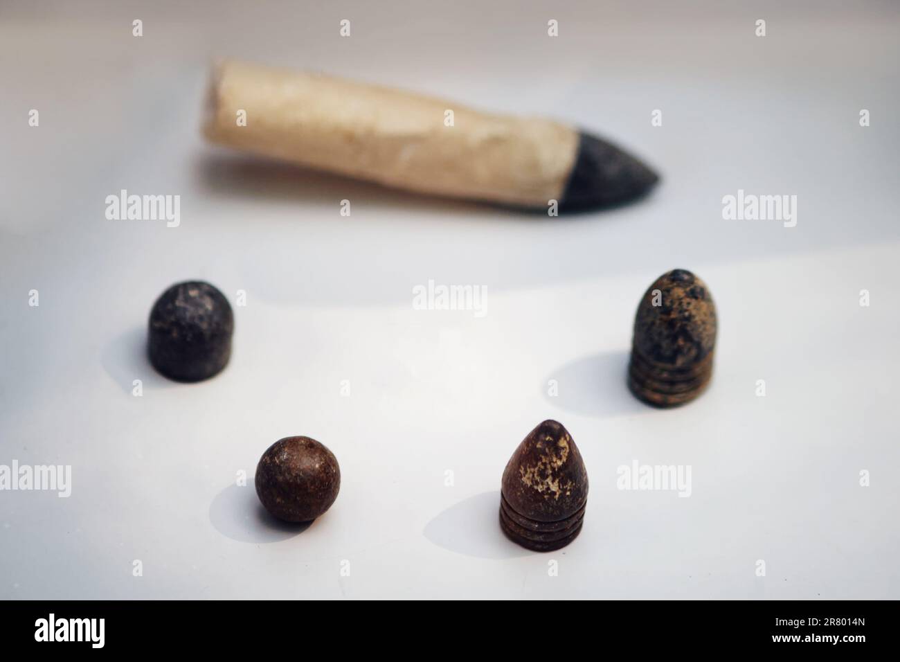 Bullets fired from a gun. Uniforms of soldiers of the middle of the ...
