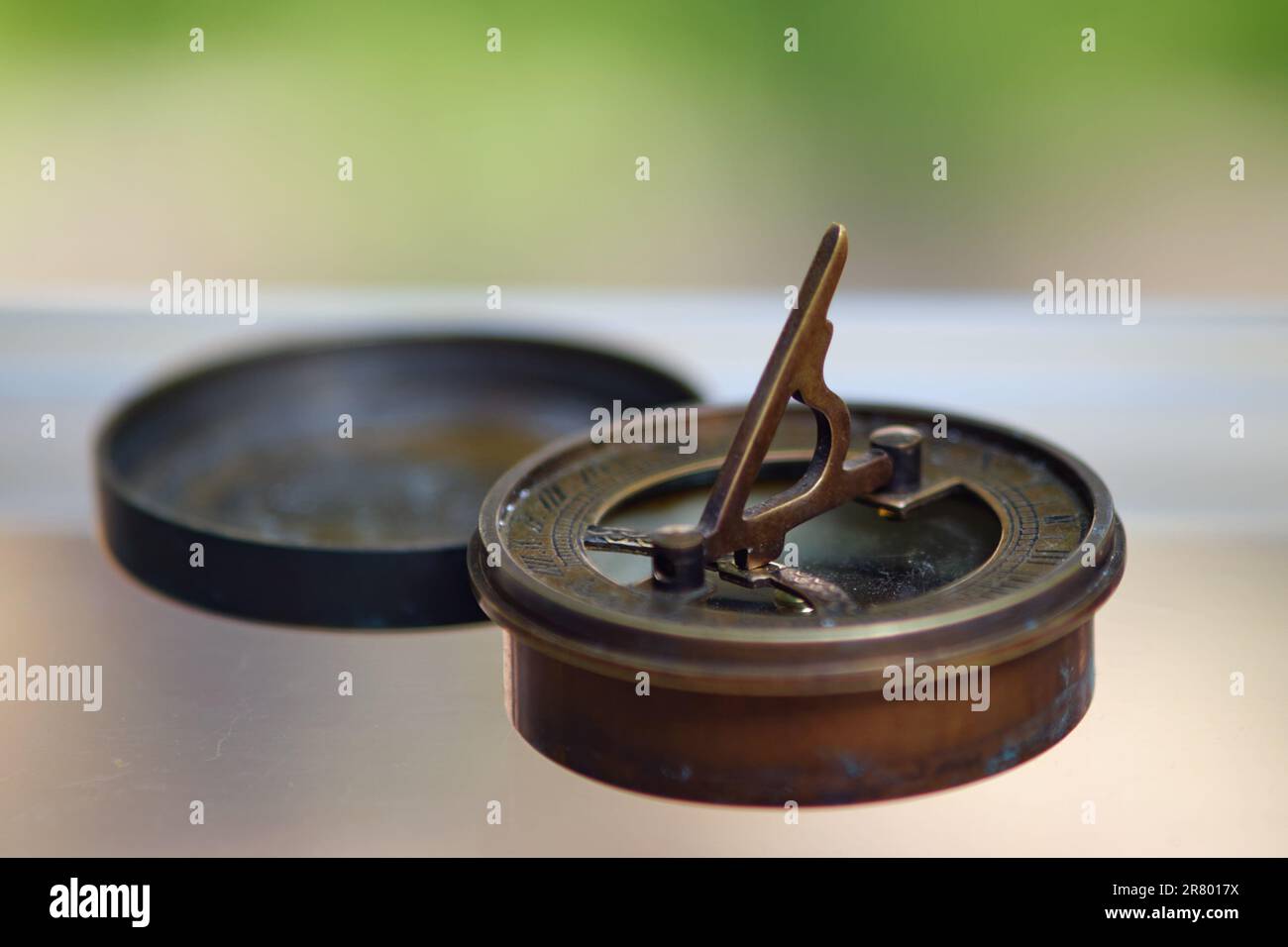 Antique ship compass made of brass. Old objects of the 18th century era ...