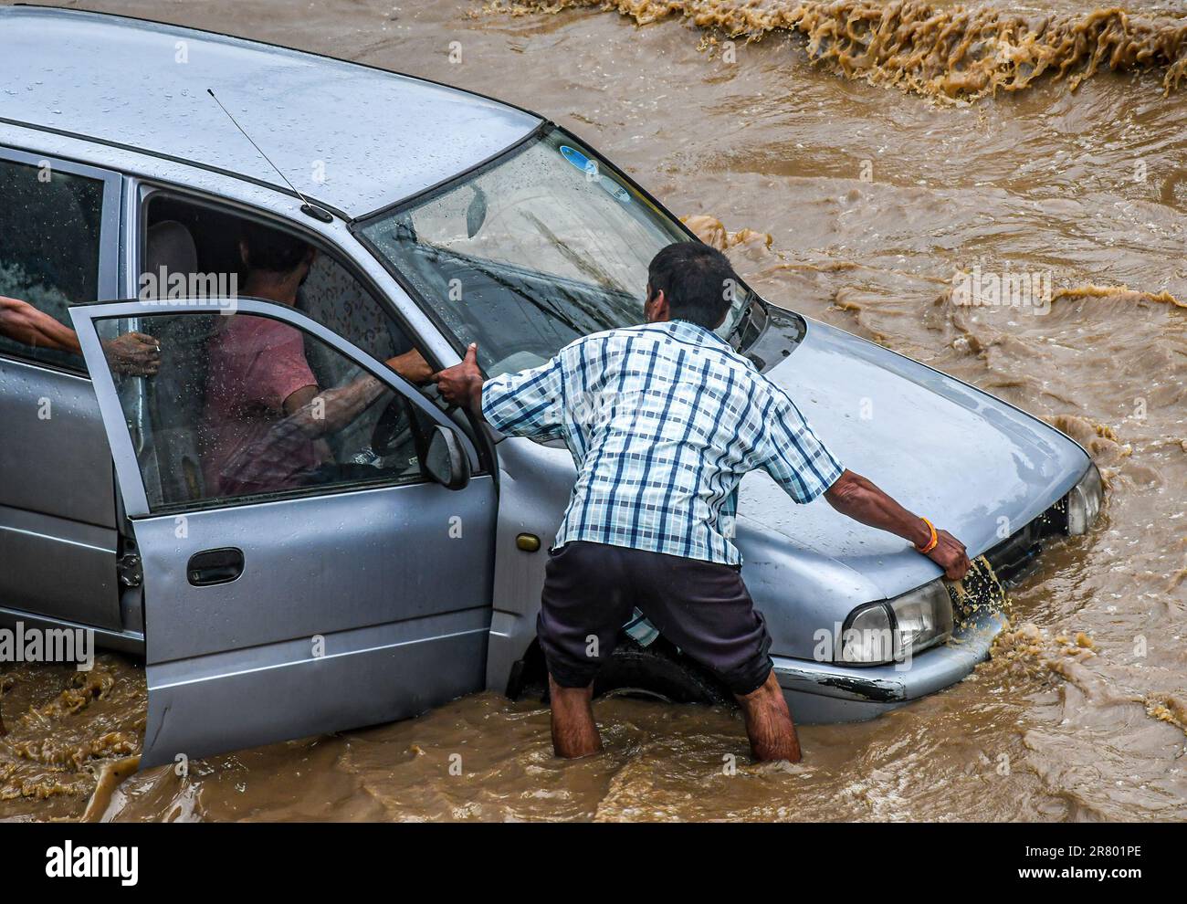 Push car in flood hi-res stock photography and images - Alamy