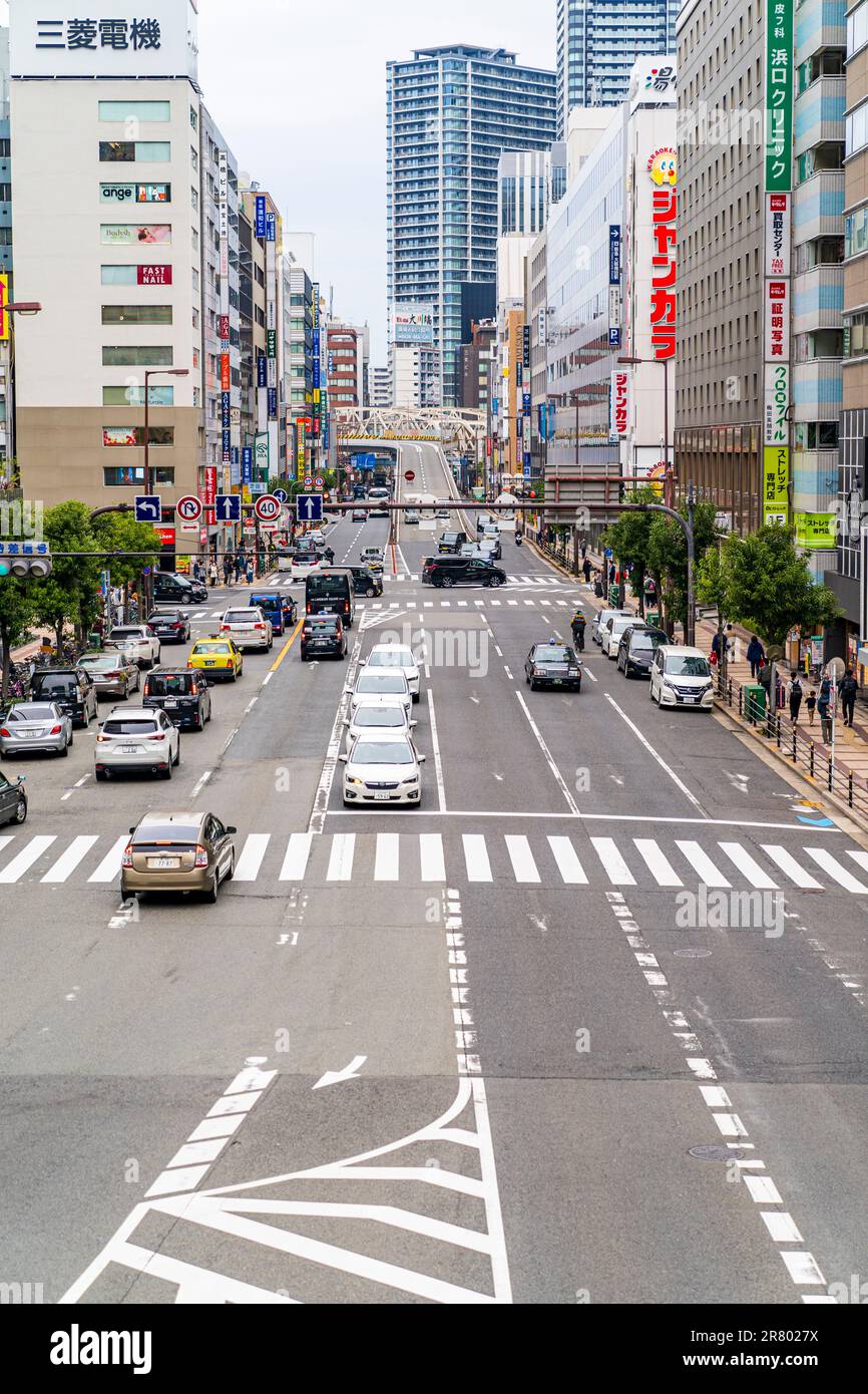 View along Route 176 in Umeda, Osaka. Typical urban scene with high ...