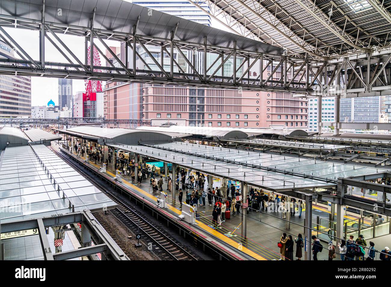 Overhead view of platforms at Osaka Station in Japan. Lines of ...