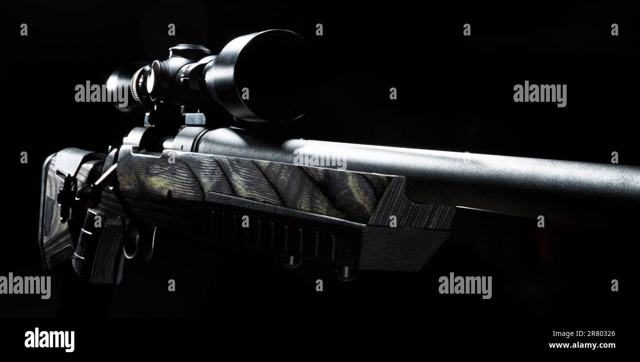 Riflescope on a bolt action rifle with a black background Stock Photo ...