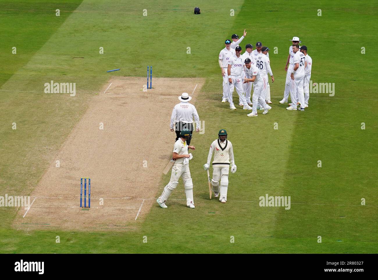 Australia’s Pat Cummins (left) consoles Australia’s Usman Khawaja as he ...