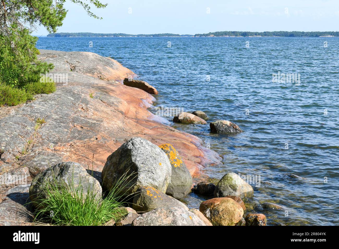 Beautiful green rocky beach hi-res stock photography and images - Alamy
